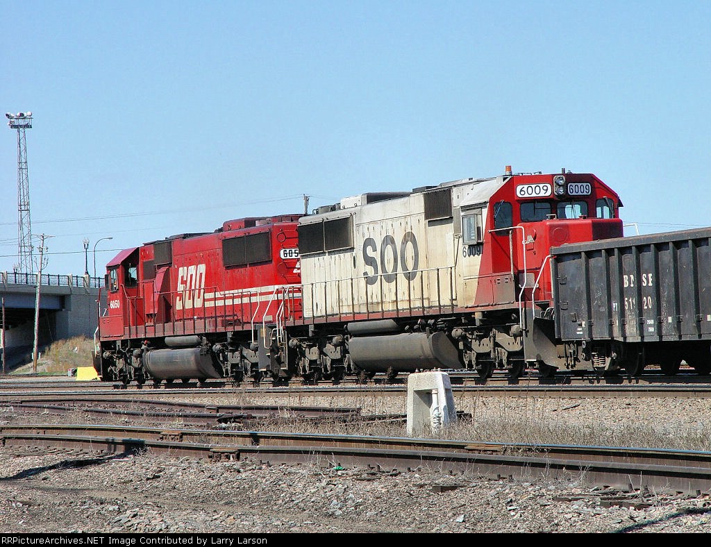 Mean Lean (ing) machines. About the only thing not leaning is the highway bridge.